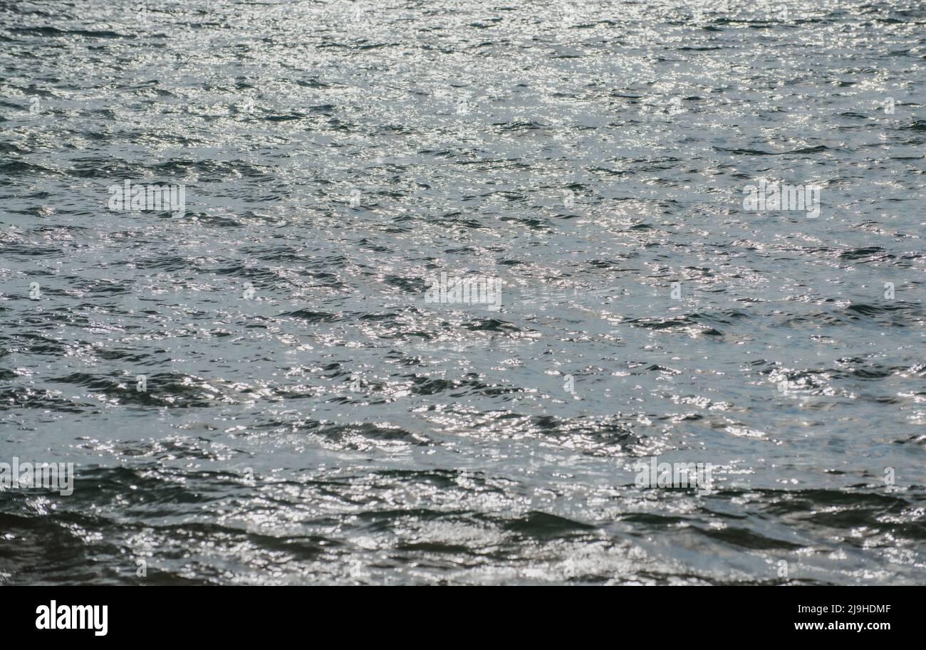 Calm sea water surface texture with splashes and waves. Abstract nature ...