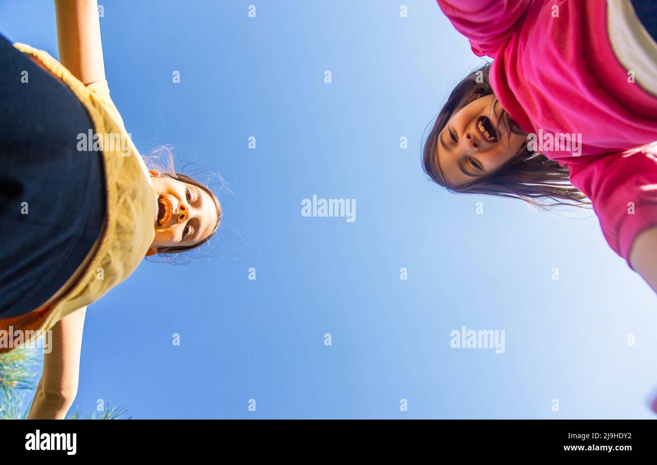 Children walk together in a friend's folder. Selective focus Stock ...