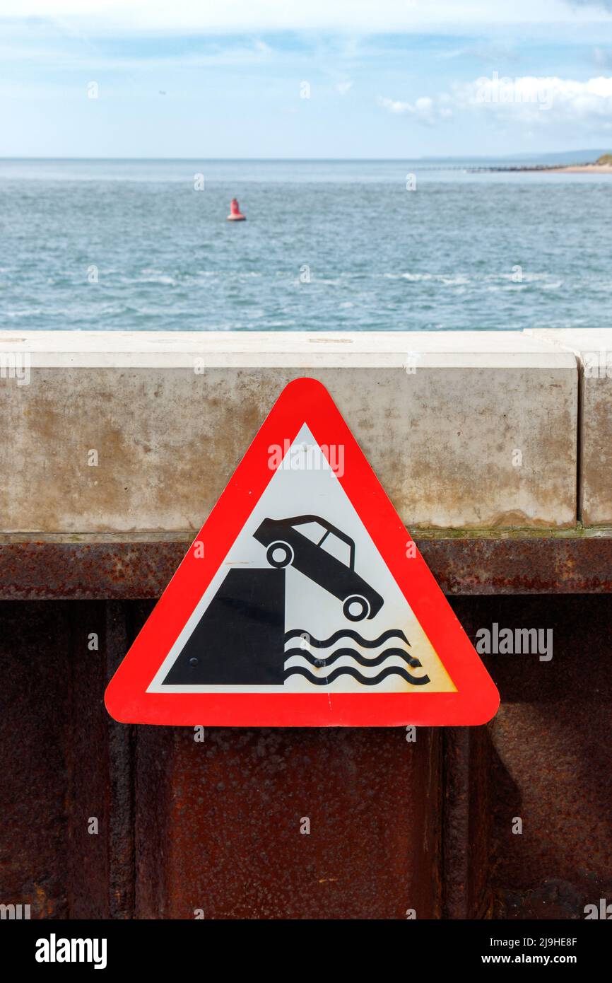 car and deep water warning sign in Exmouth Devon UK Stock Photo - Alamy