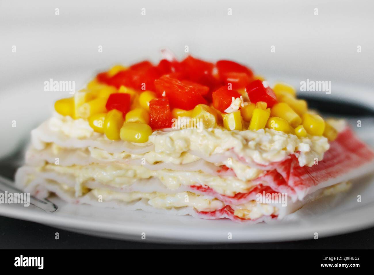New recipe. Fish surimi cake with paprika Stock Photo - Alamy