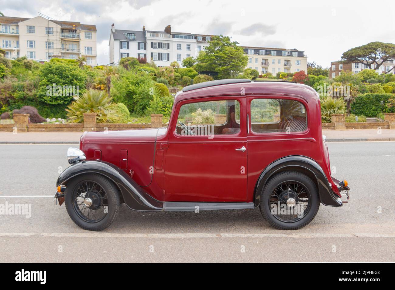 side view of 1930s vintage maroon Austin seven New Ruby in Exmouth ...