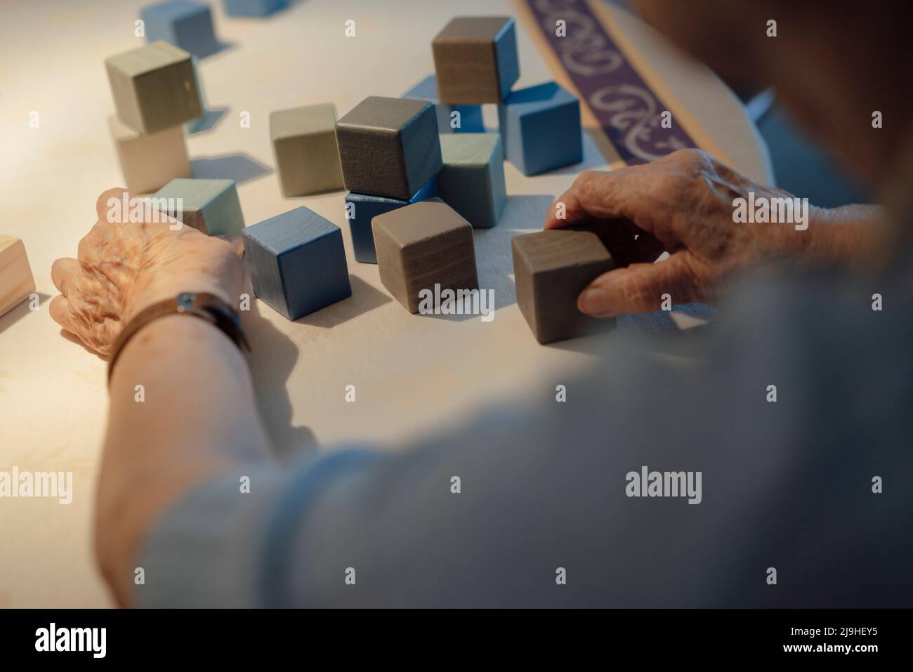 Woman building blocks hi-res stock photography and images - Alamy