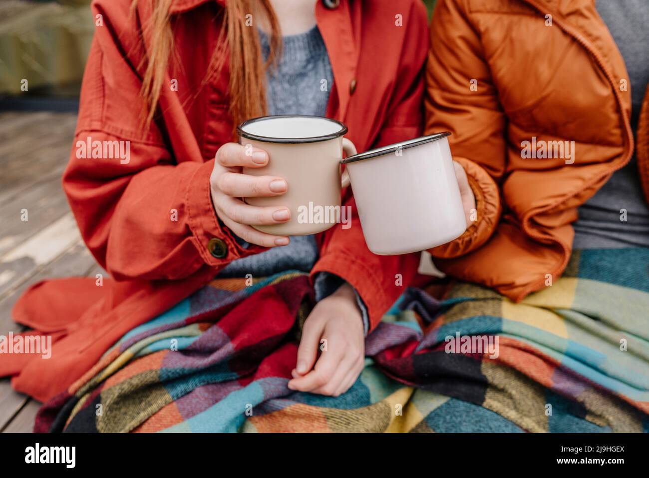 Toasting with cups hi-res stock photography and images - Alamy
