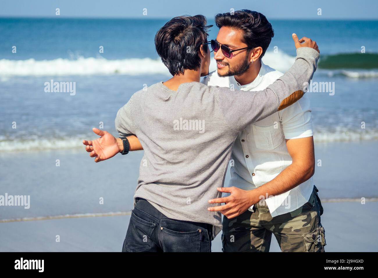 Indian men hugging hi-res stock photography and images - Alamy