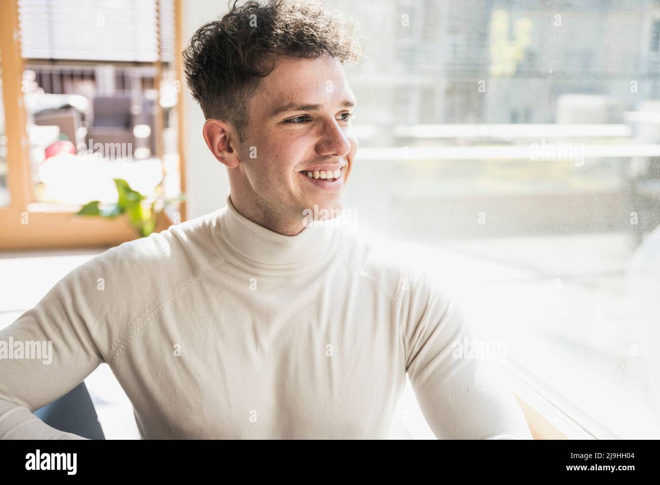 Creative businessman smile thinking hi-res stock photography and images ...