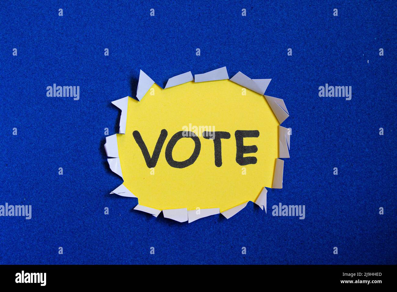 Paper torn with vote inscription. Concept of voting for political ...