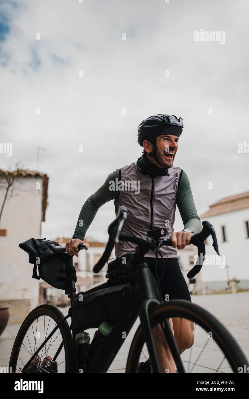 Man walking with helmet hi-res stock photography and images - Alamy