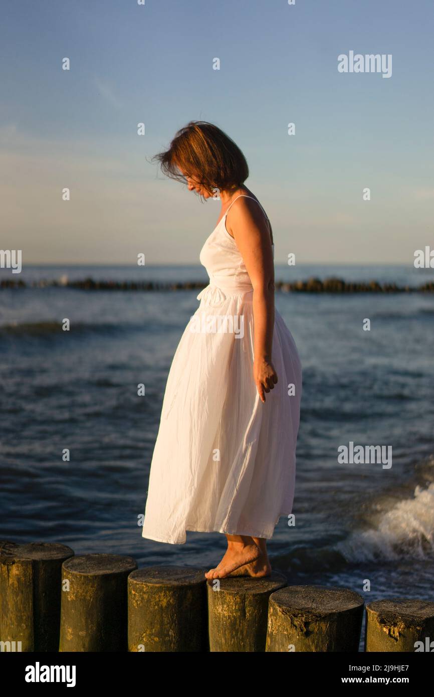 Standing on post and looking down hi-res stock photography and images ...