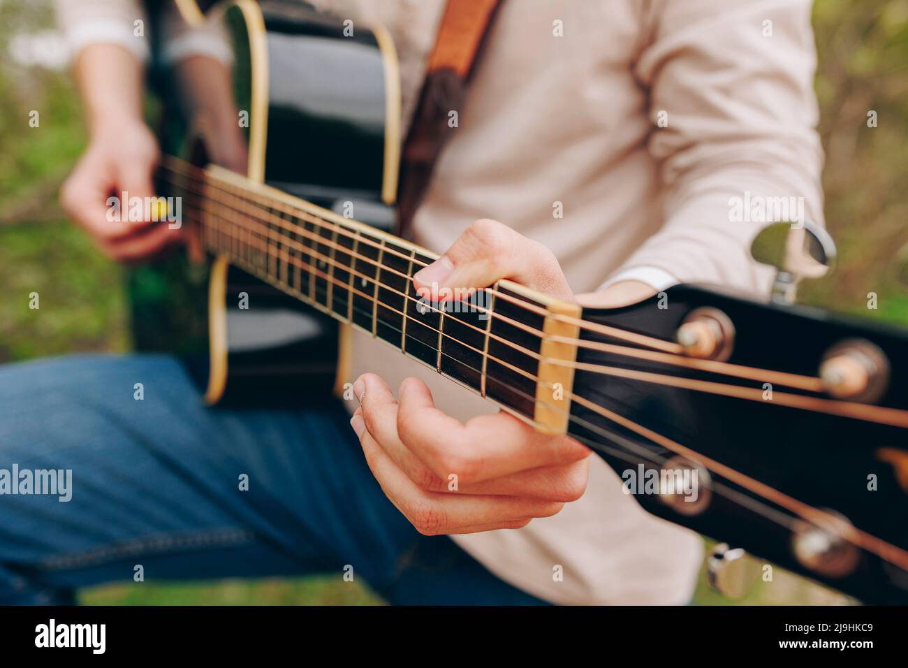 Plucking an instrument horizontal hi-res stock photography and images ...