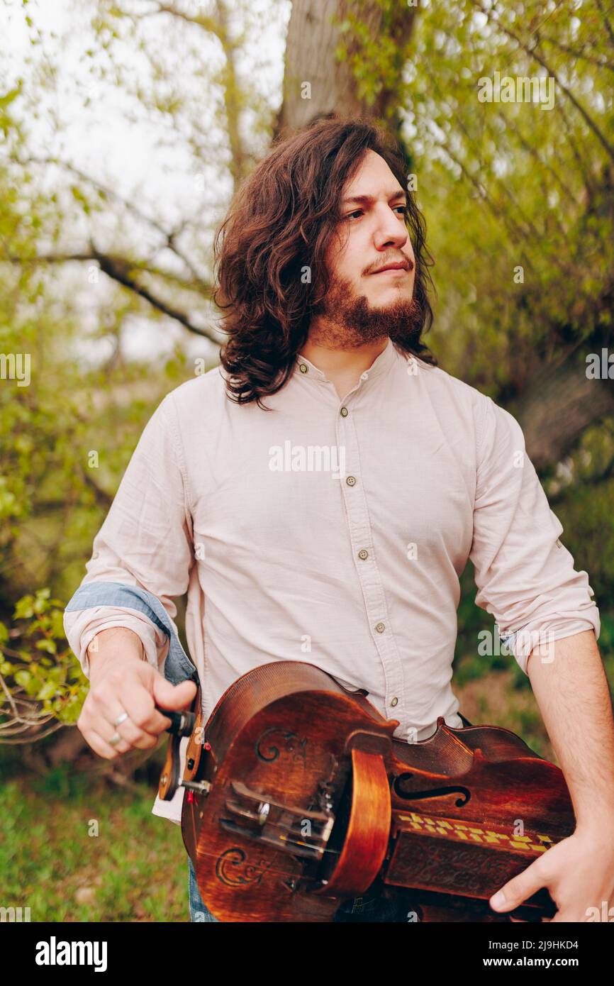 Man long hair hi-res stock photography and images - Alamy