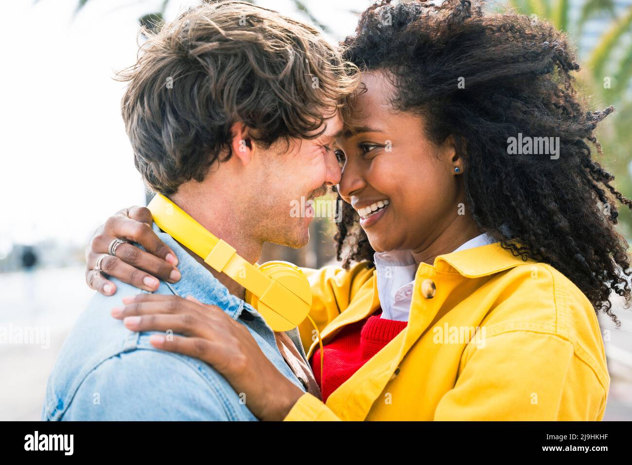 Happy romantic couple rubbing noses Stock Photo - Alamy
