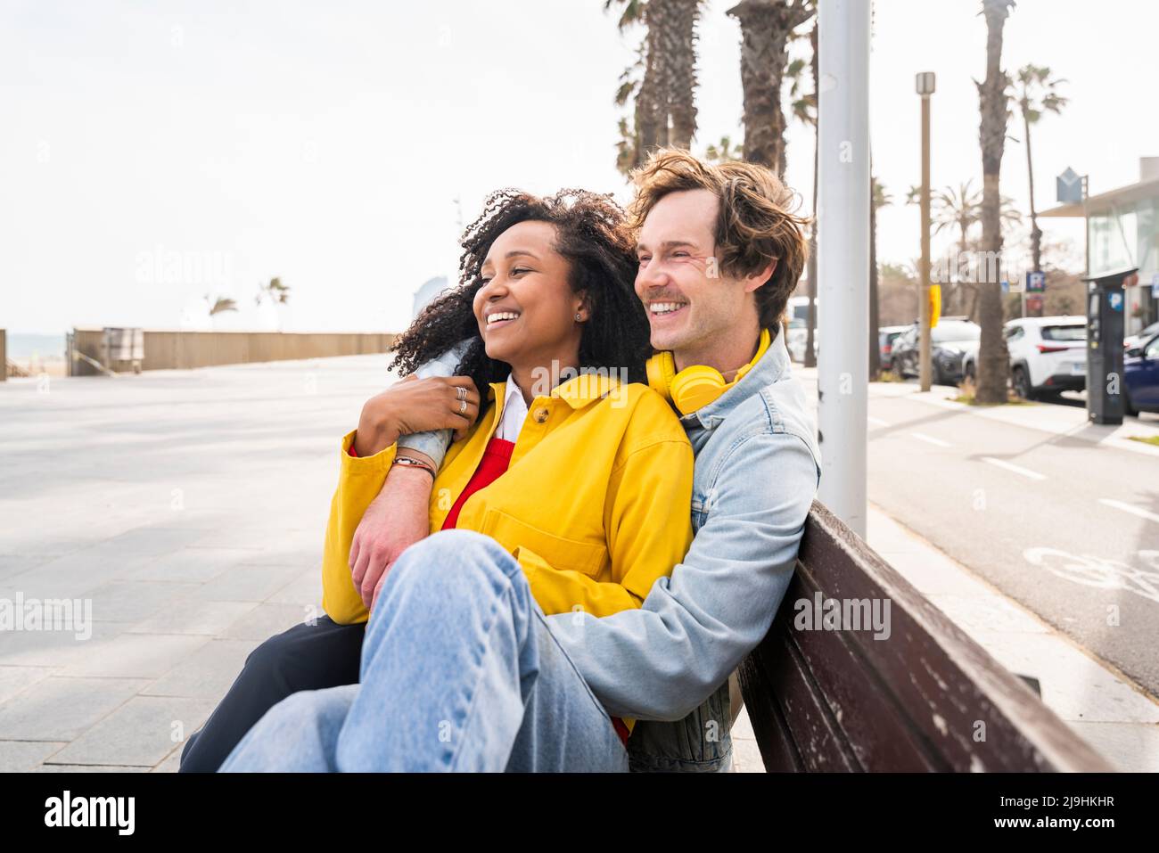 Group people sitting around wooden hi-res stock photography and images ...