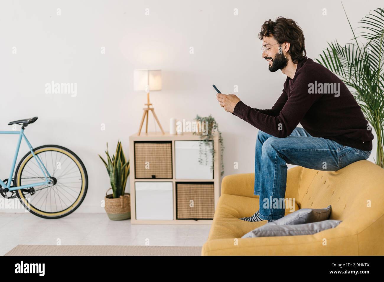 Happy man beard sitting hi-res stock photography and images - Alamy