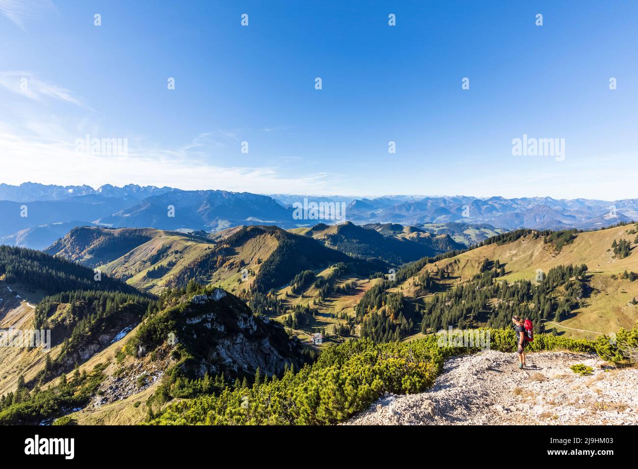 Female hiker admiring view chiemgau alps way to geigelstein mountain hi ...