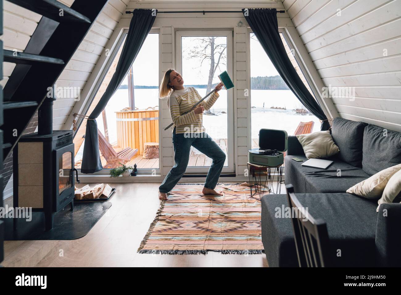 Woman broom hi-res stock photography and images - Alamy