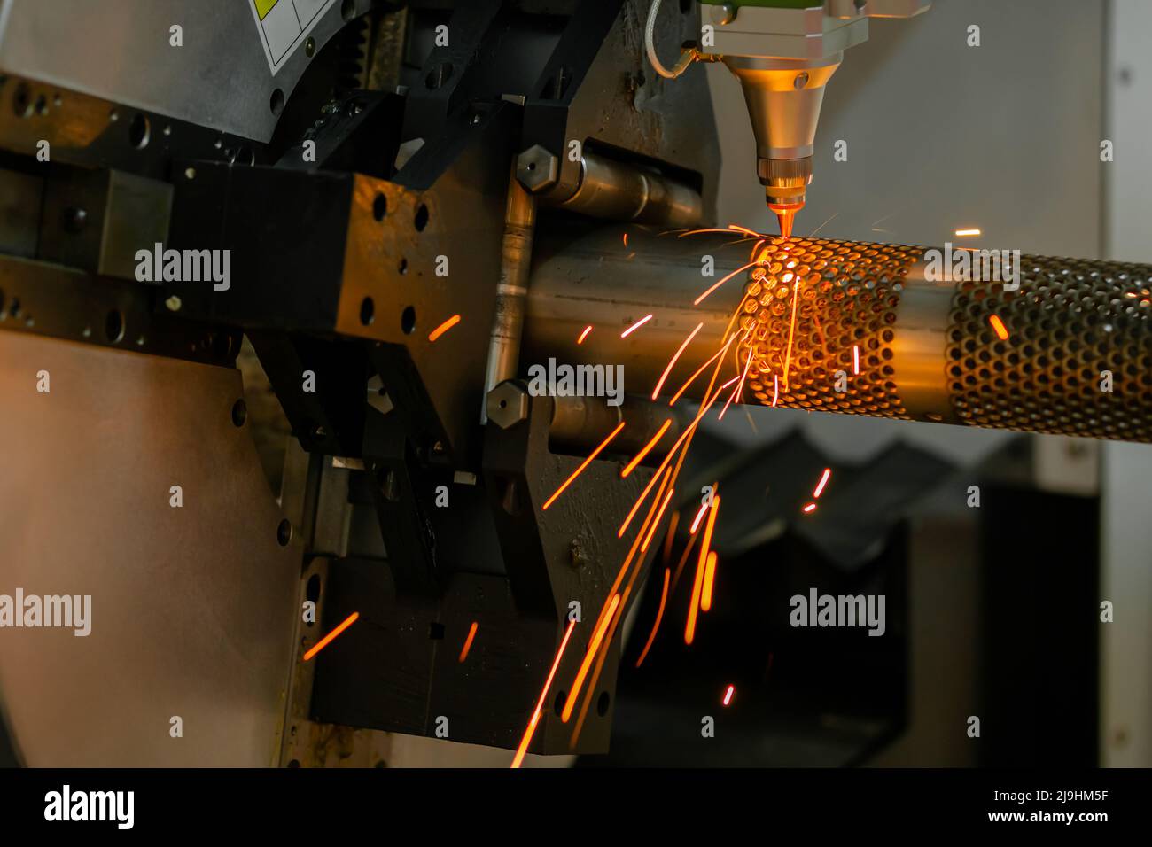 Laser cutting machine working with metal workpiece with sparks Stock ...