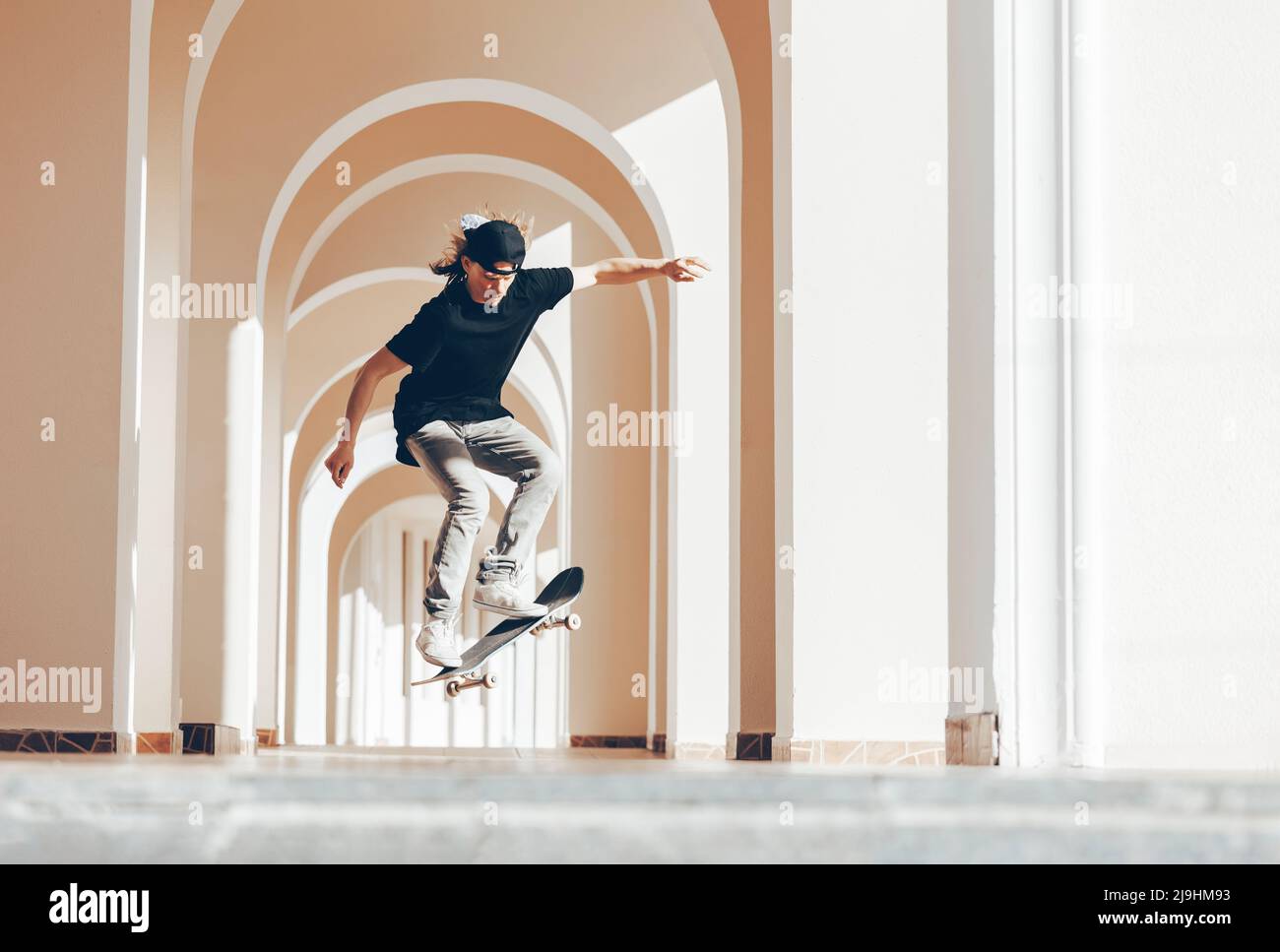 Skateboard trick jump hi-res stock photography and images - Alamy