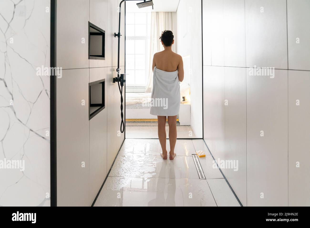Woman taking a shower hi-res stock photography and images - Alamy