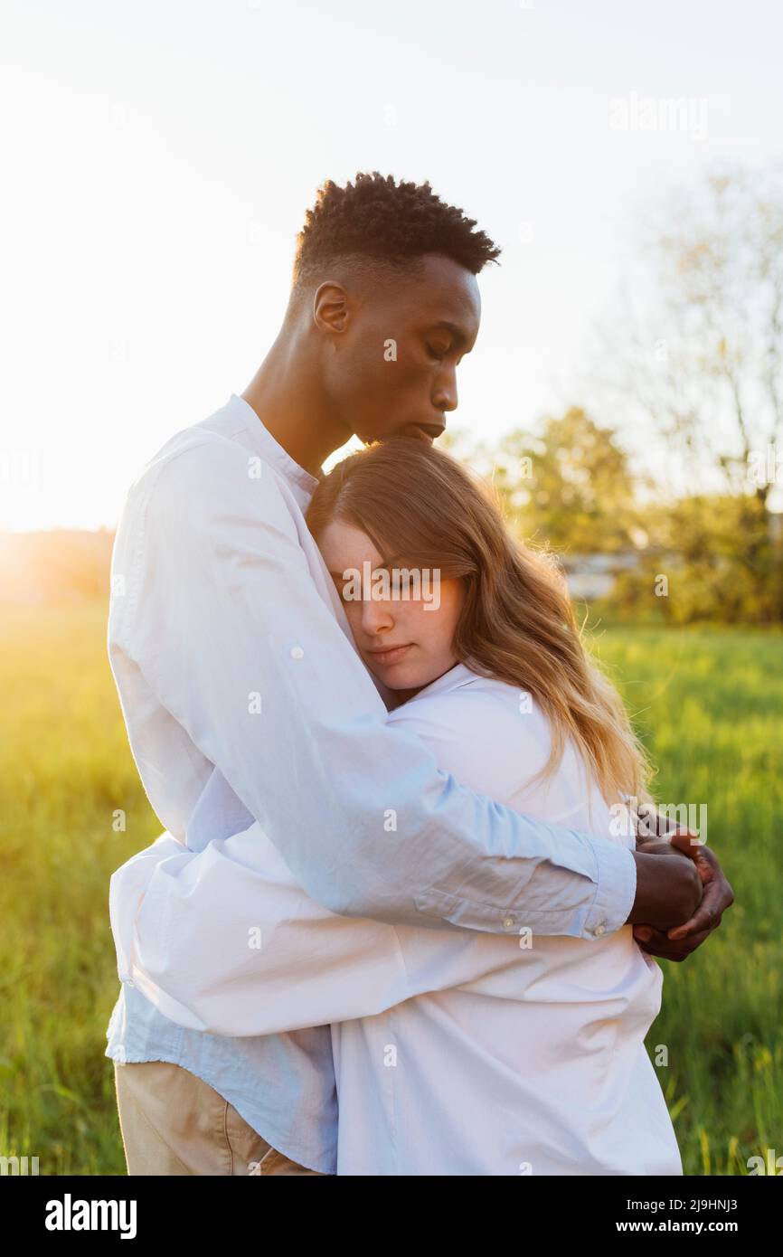 African american couple hugging other hi-res stock photography and ...