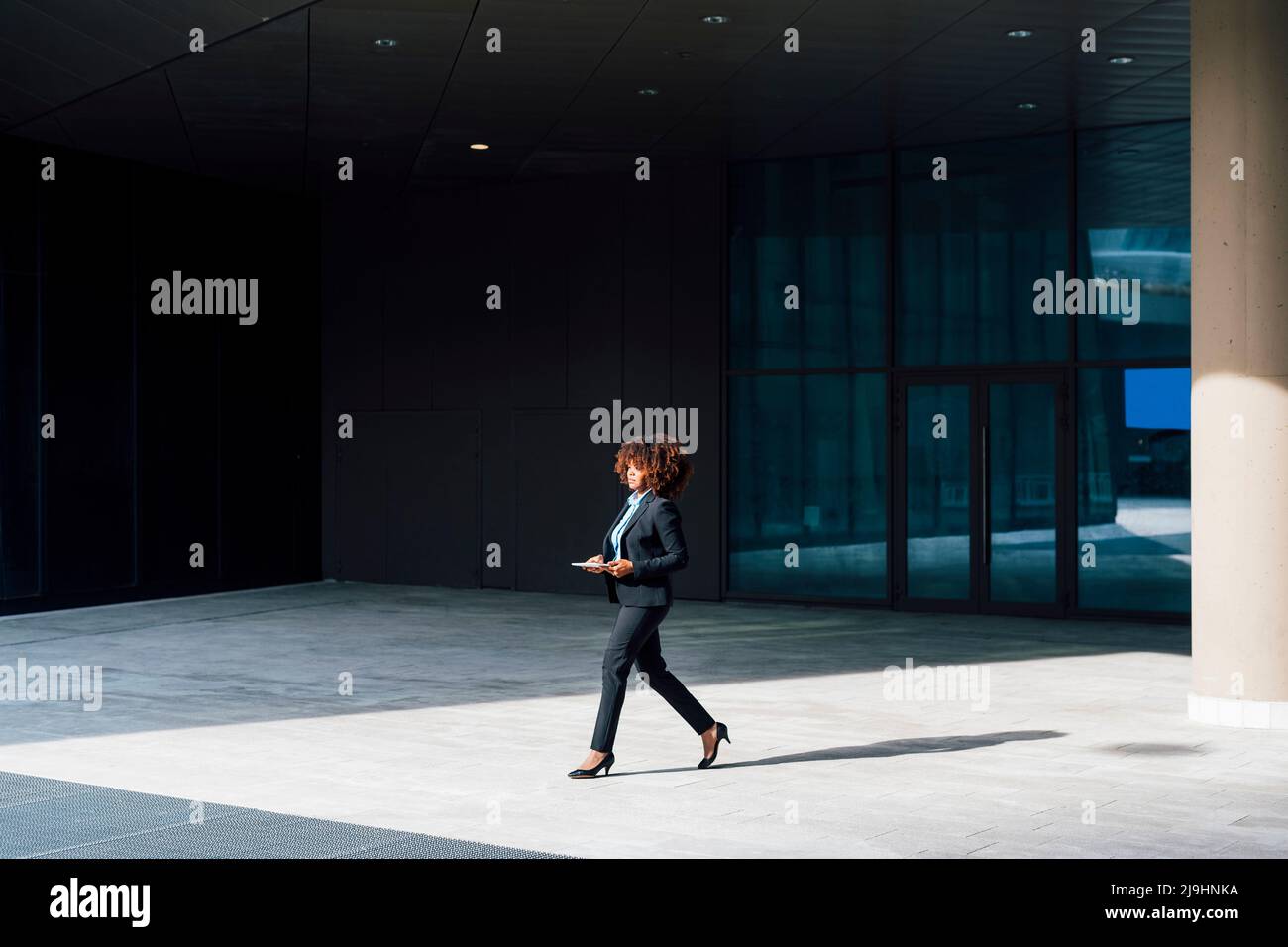 Walking holding architecture building exterior hi-res stock photography ...