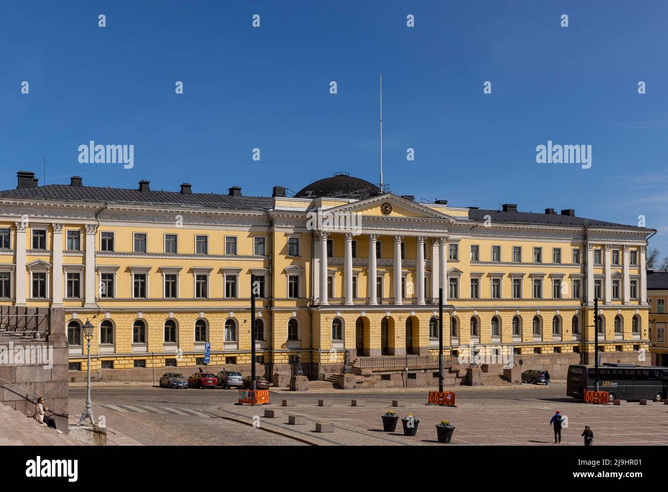 Finnish government building standing downtown Helsinki on a bright ...