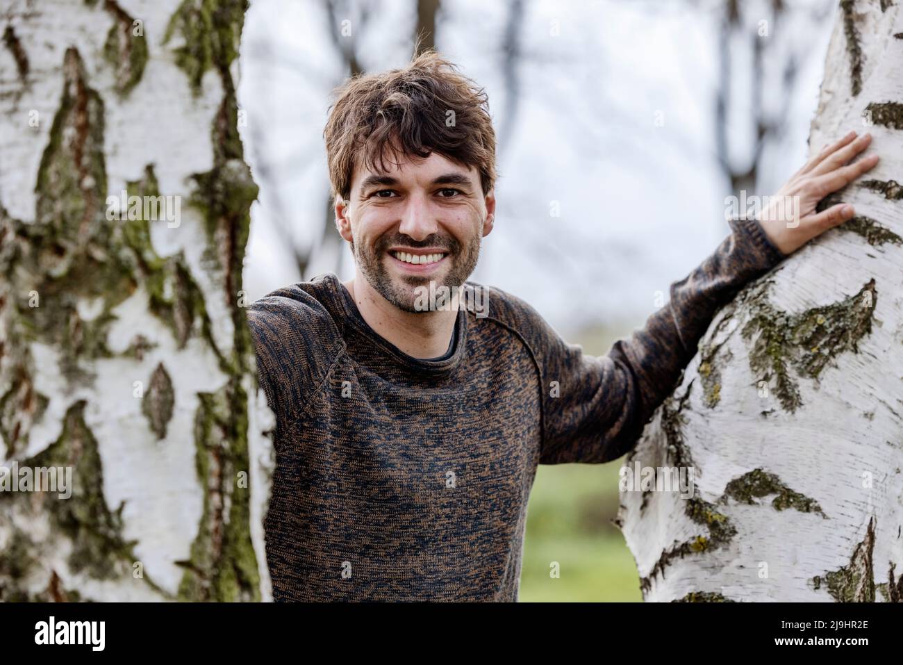 Happy man tree hi-res stock photography and images - Alamy