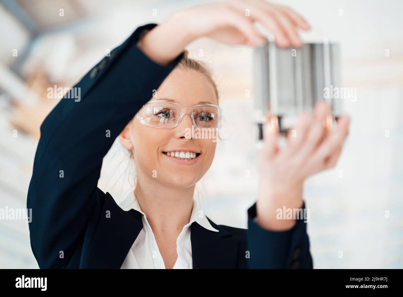 Professional looking business woman in front of office building hi-res ...
