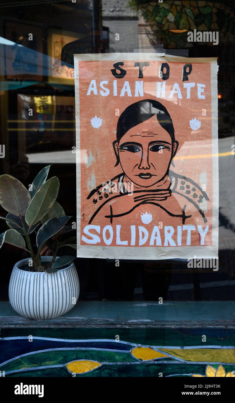 A "Stop Asian Hate" poster in a bar window in the North Beach ...