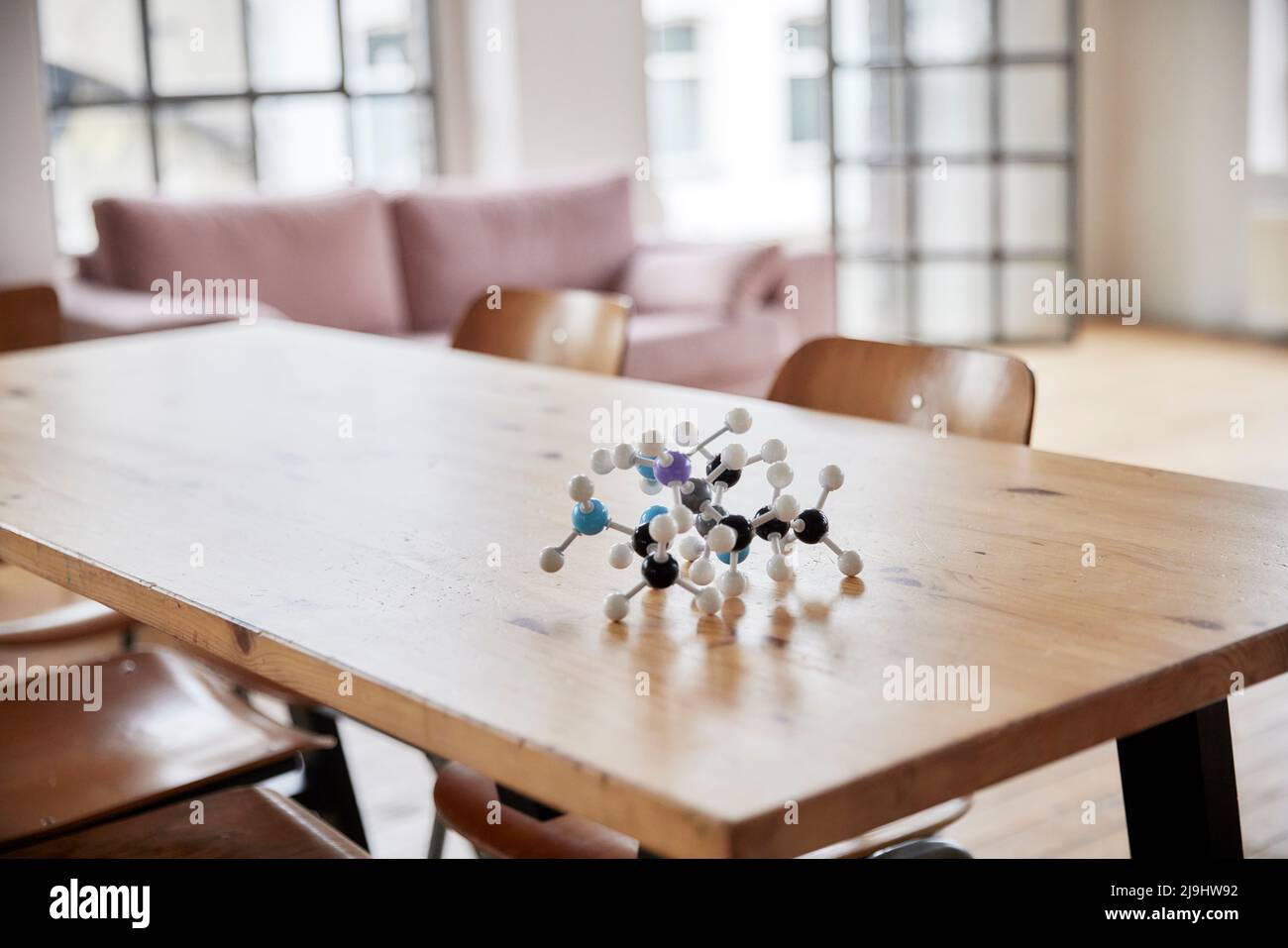 Molecular structure on dining table at home Stock Photo - Alamy