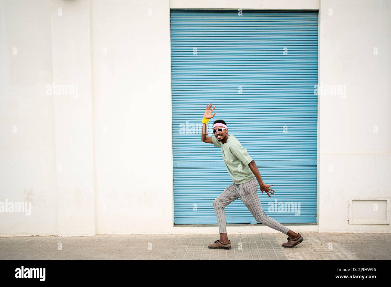 Portrait playful young man dancing hi-res stock photography and images ...