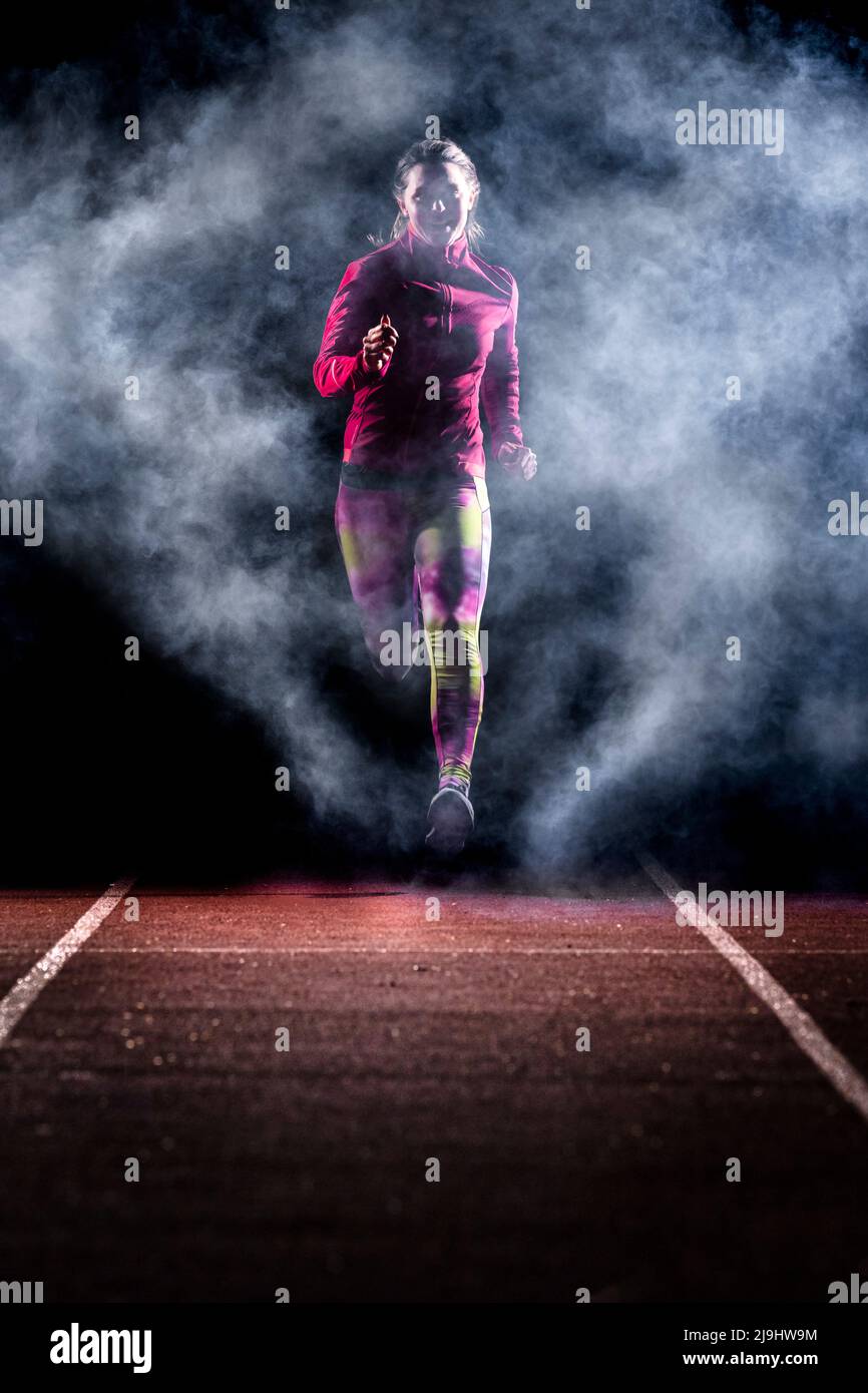 Running night track hi-res stock photography and images - Alamy