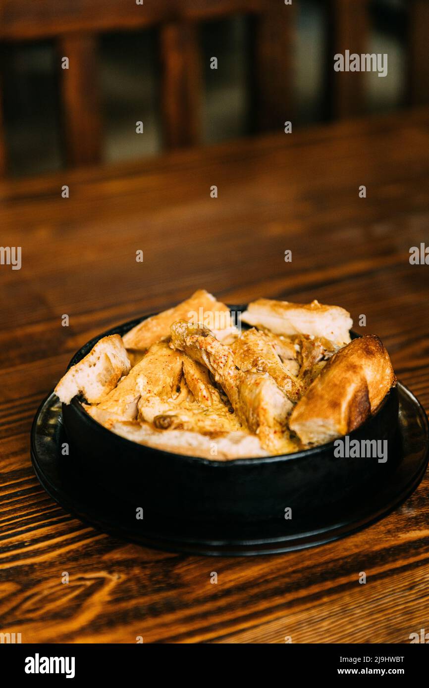 Chkmeruli or Shkmeruli is a traditional Georgian dish of chicken in ...