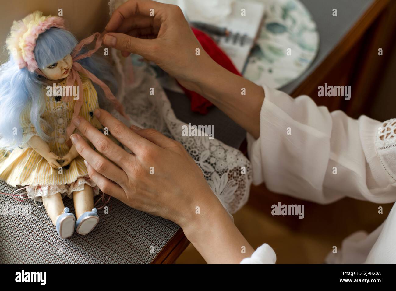 Doll hands hi-res stock photography and images - Alamy