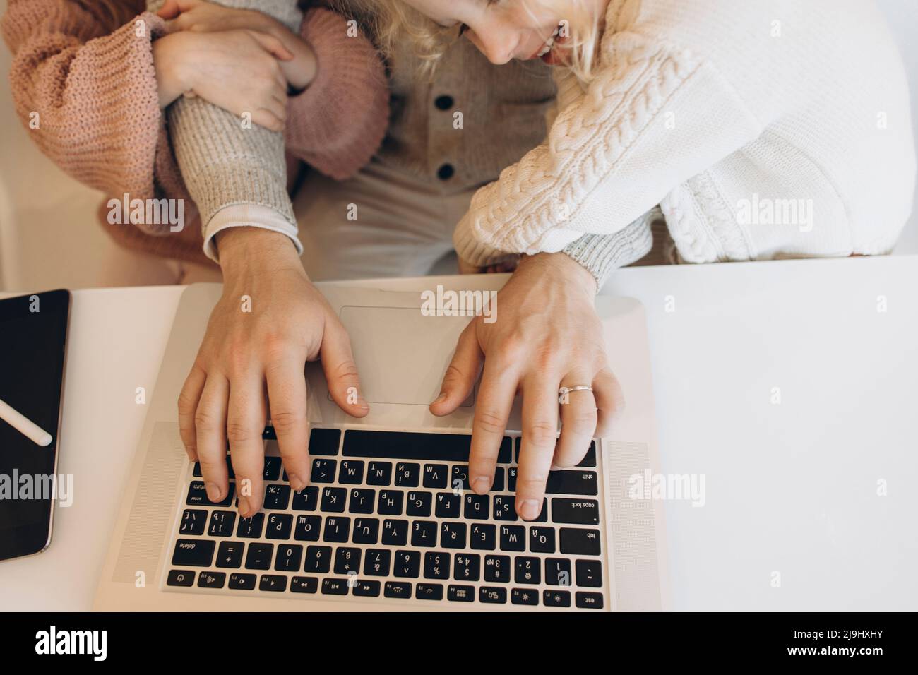 Two children hands typing hi-res stock photography and images - Alamy