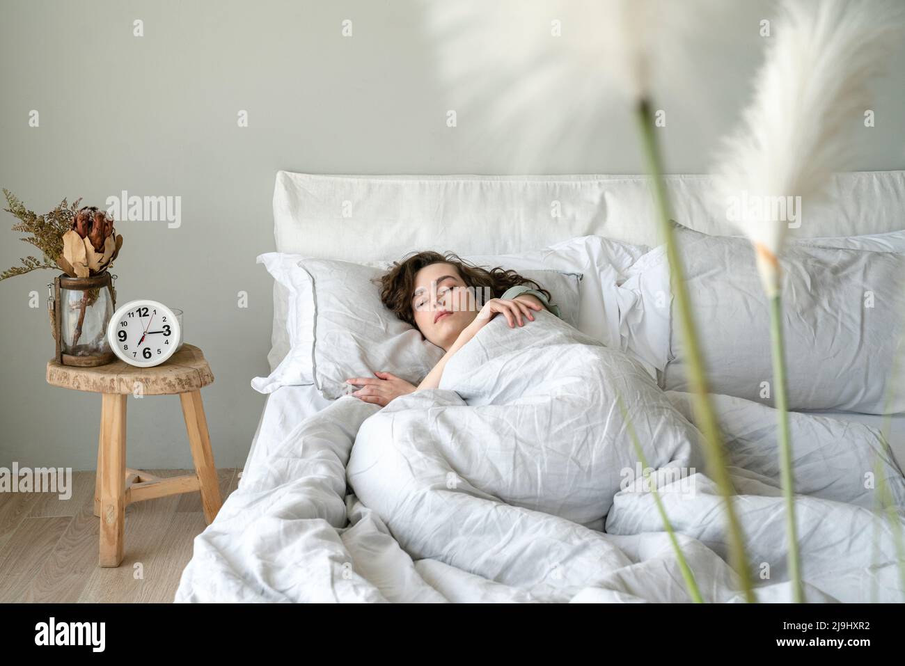 Woman sleep bed side table hi-res stock photography and images - Alamy