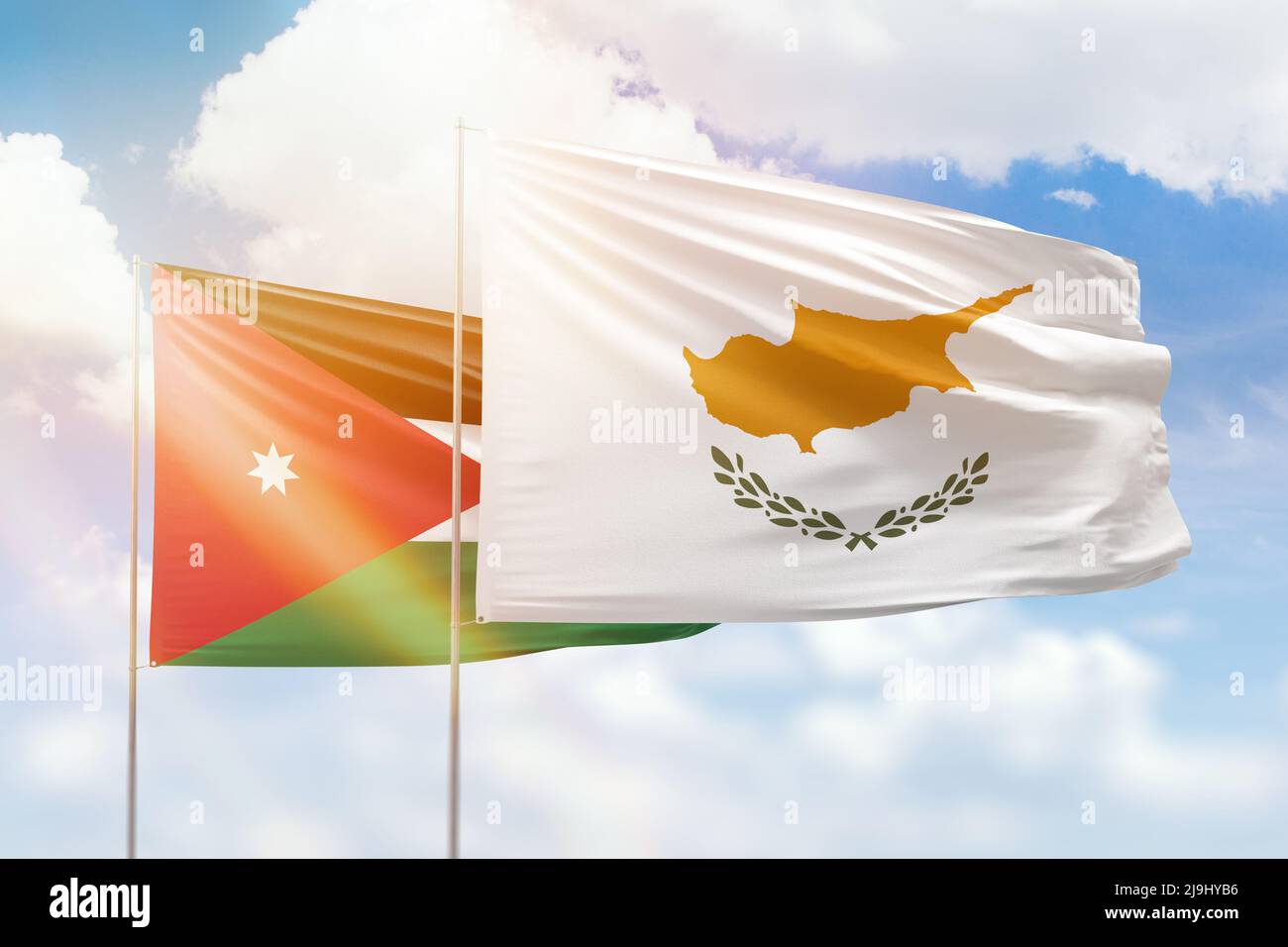 Sunny blue sky and flags of cyprus and jordan Stock Photo - Alamy