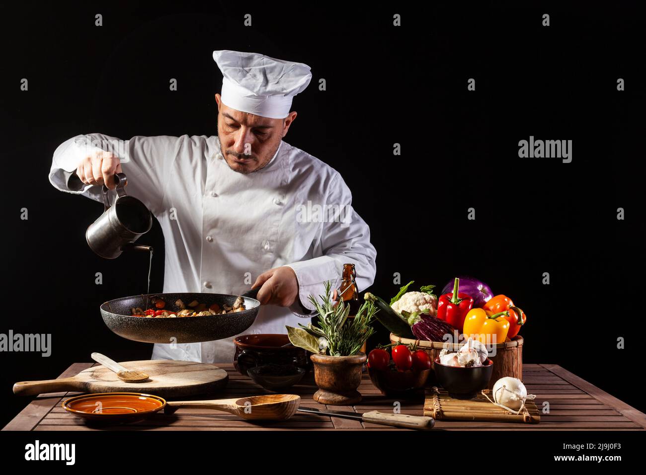 Oil pouring into a pan hi-res stock photography and images - Alamy
