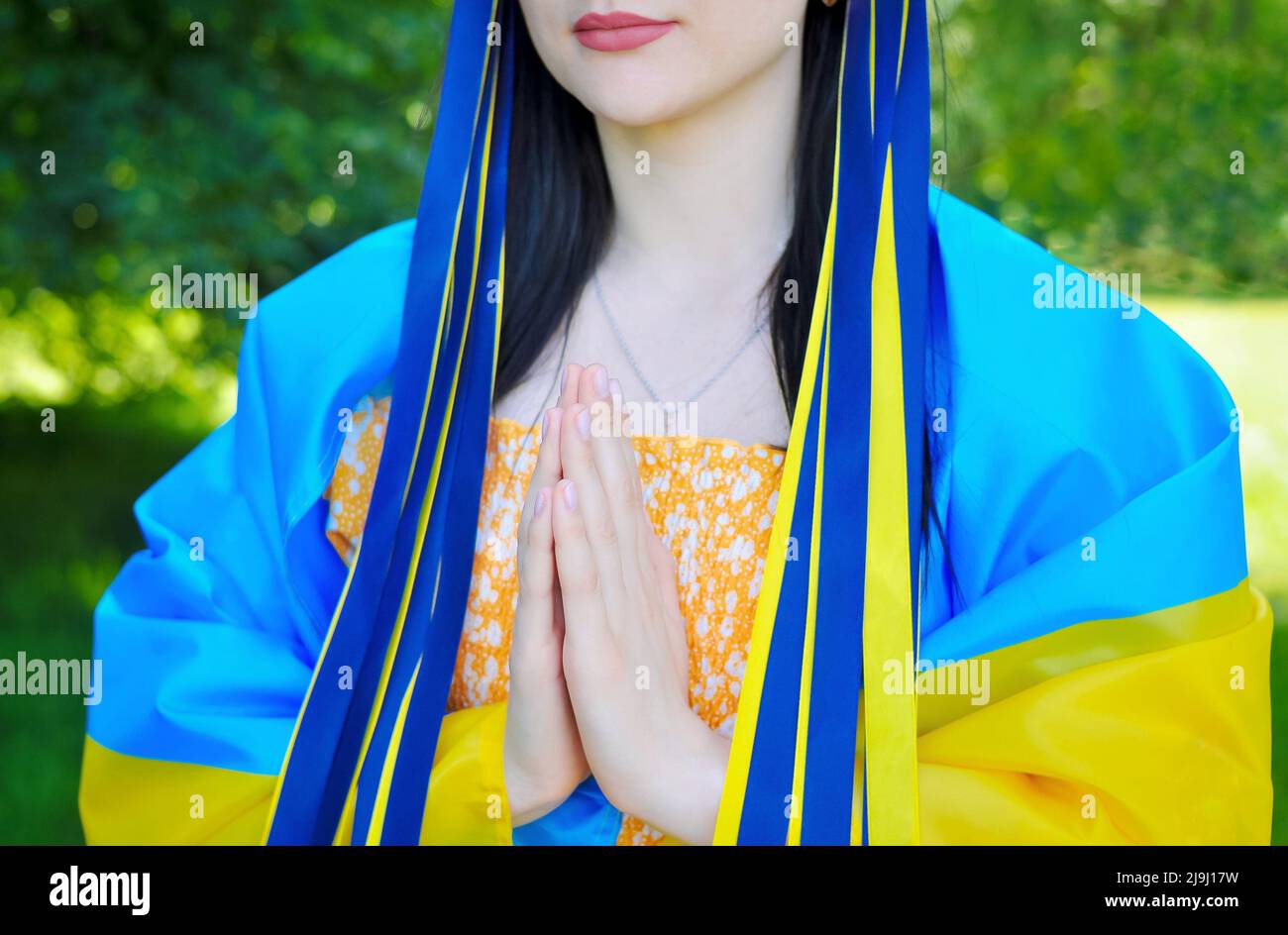 Close up of woman's hands praying for Ukraine Stock Photo - Alamy