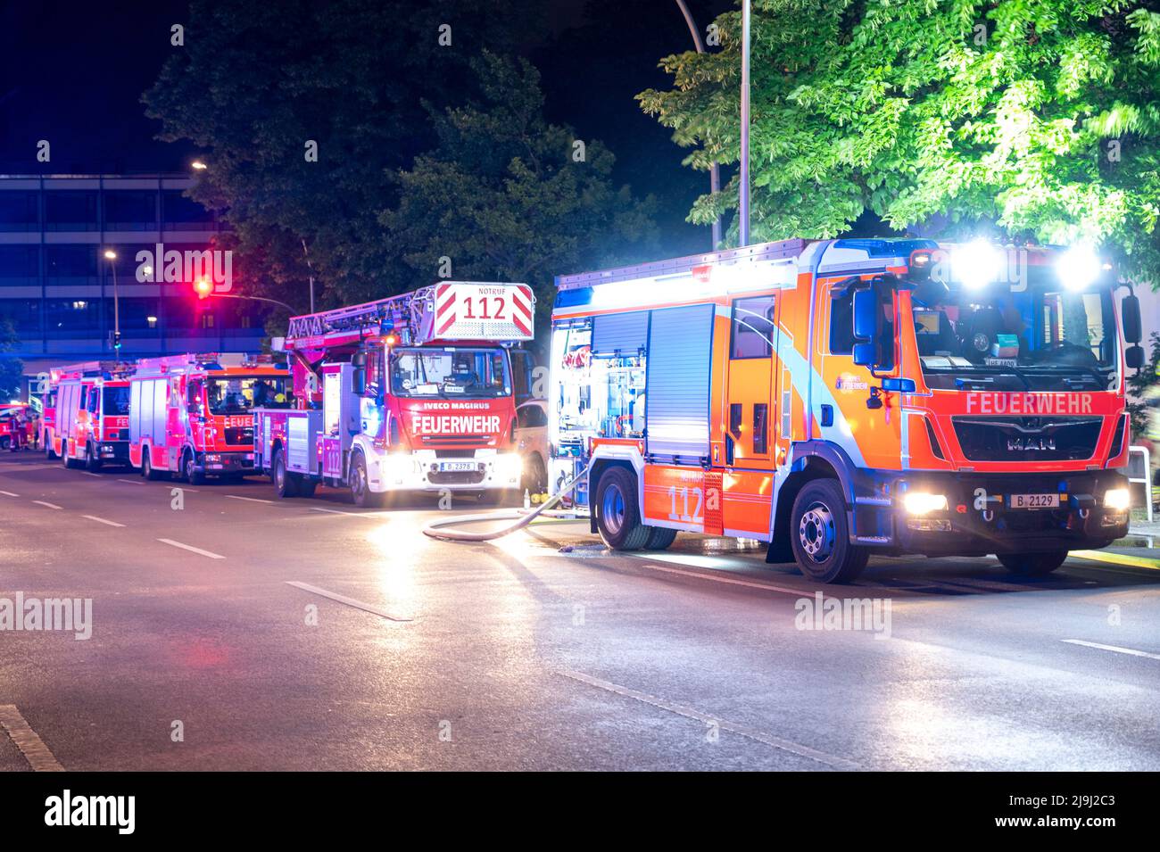 Berlin, Germany. 23rd May, 2022. Fire engines stand in front of a high ...
