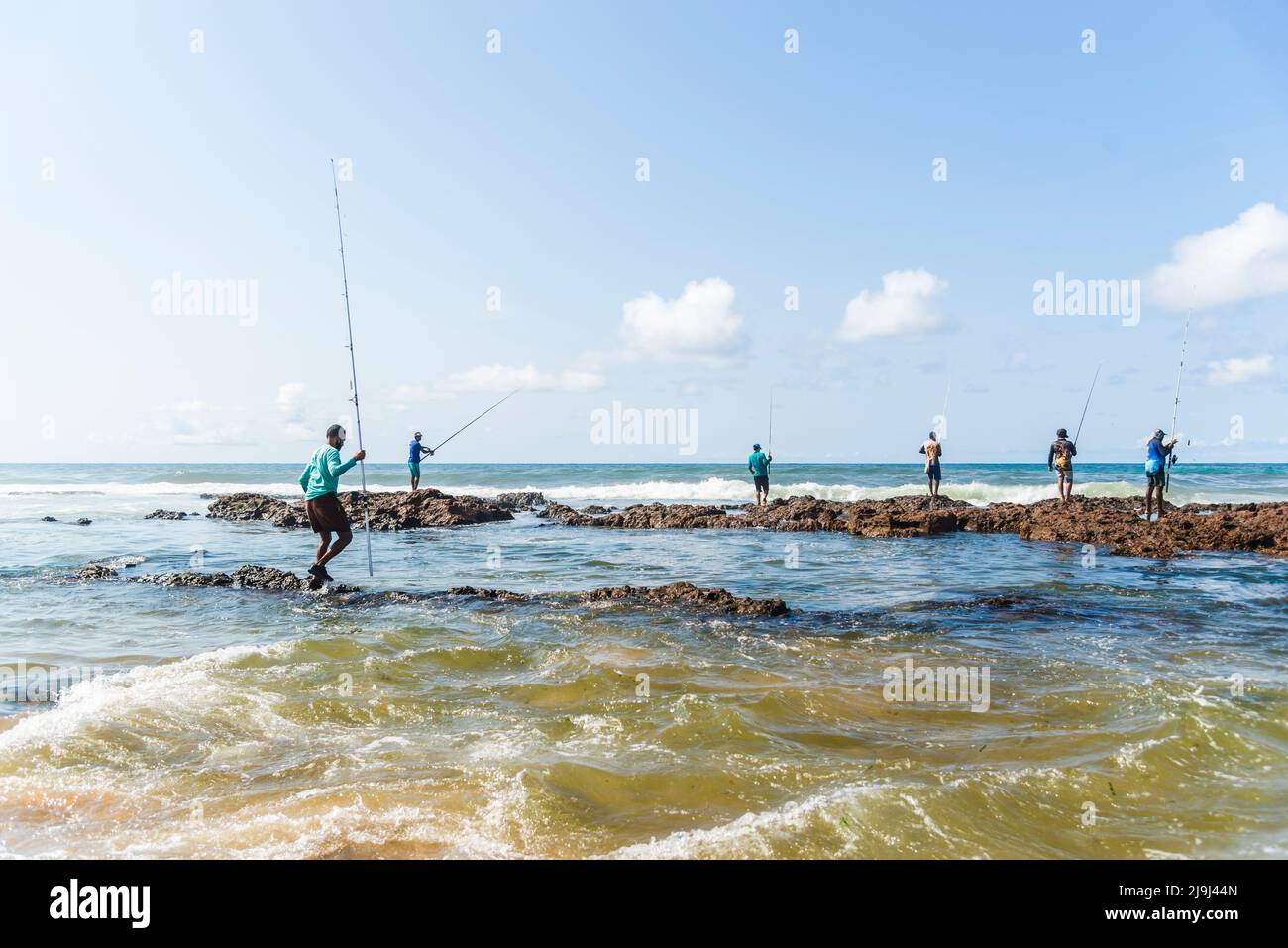 Fishermen with fishing rod on the rocks fishing on the famous Boca do ...