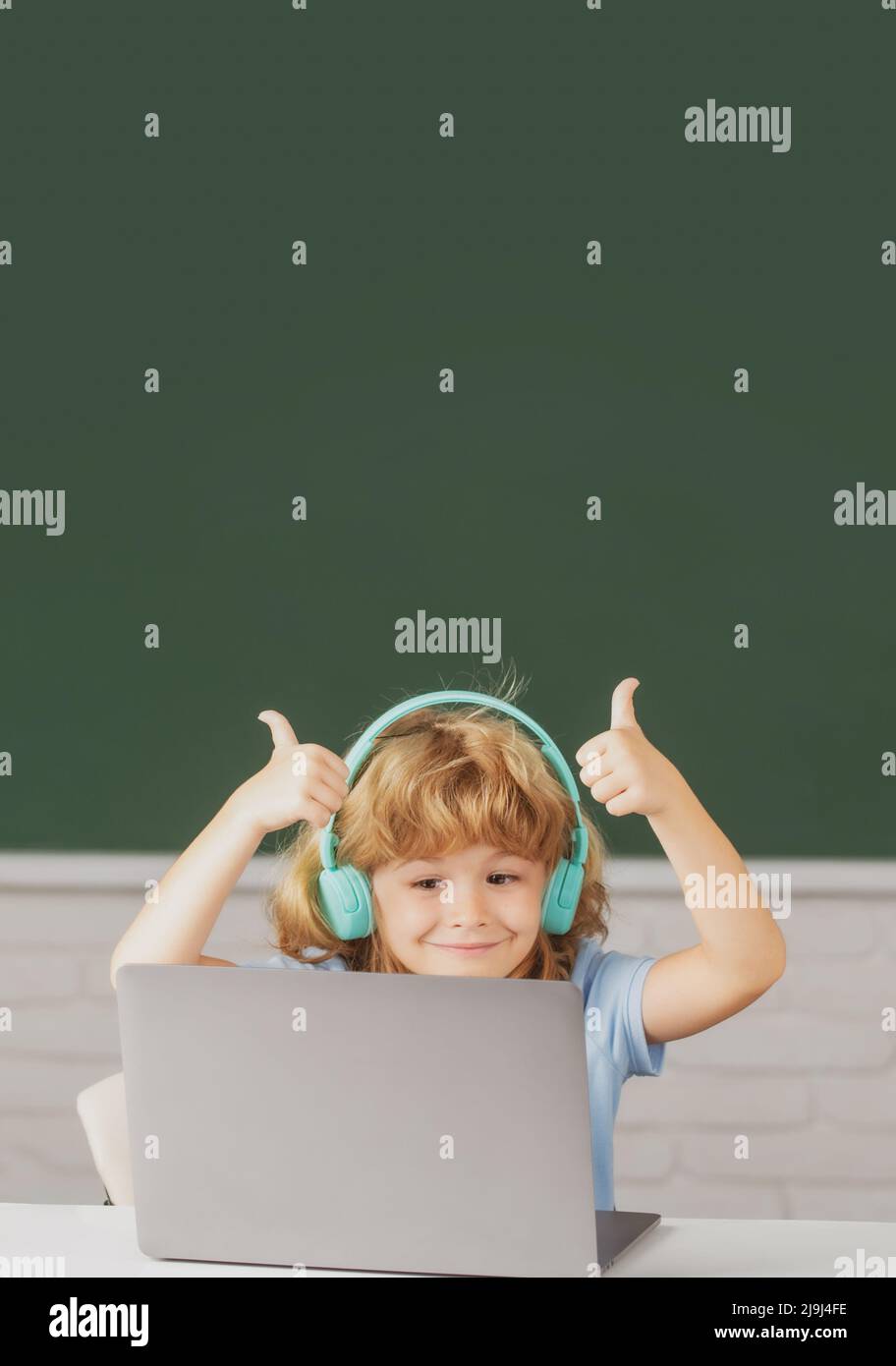 Student using headphone in classroom hi-res stock photography and ...