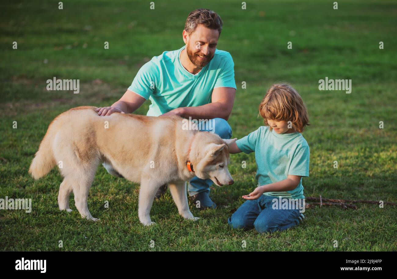 Childhood and parenthood kids concept. Happy father and son playing ...