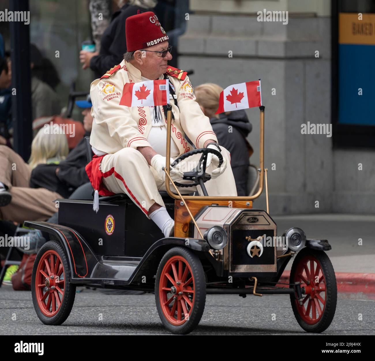 A shriner in a clown car at the Victoria Day Parade on May 23, 2022 in ...