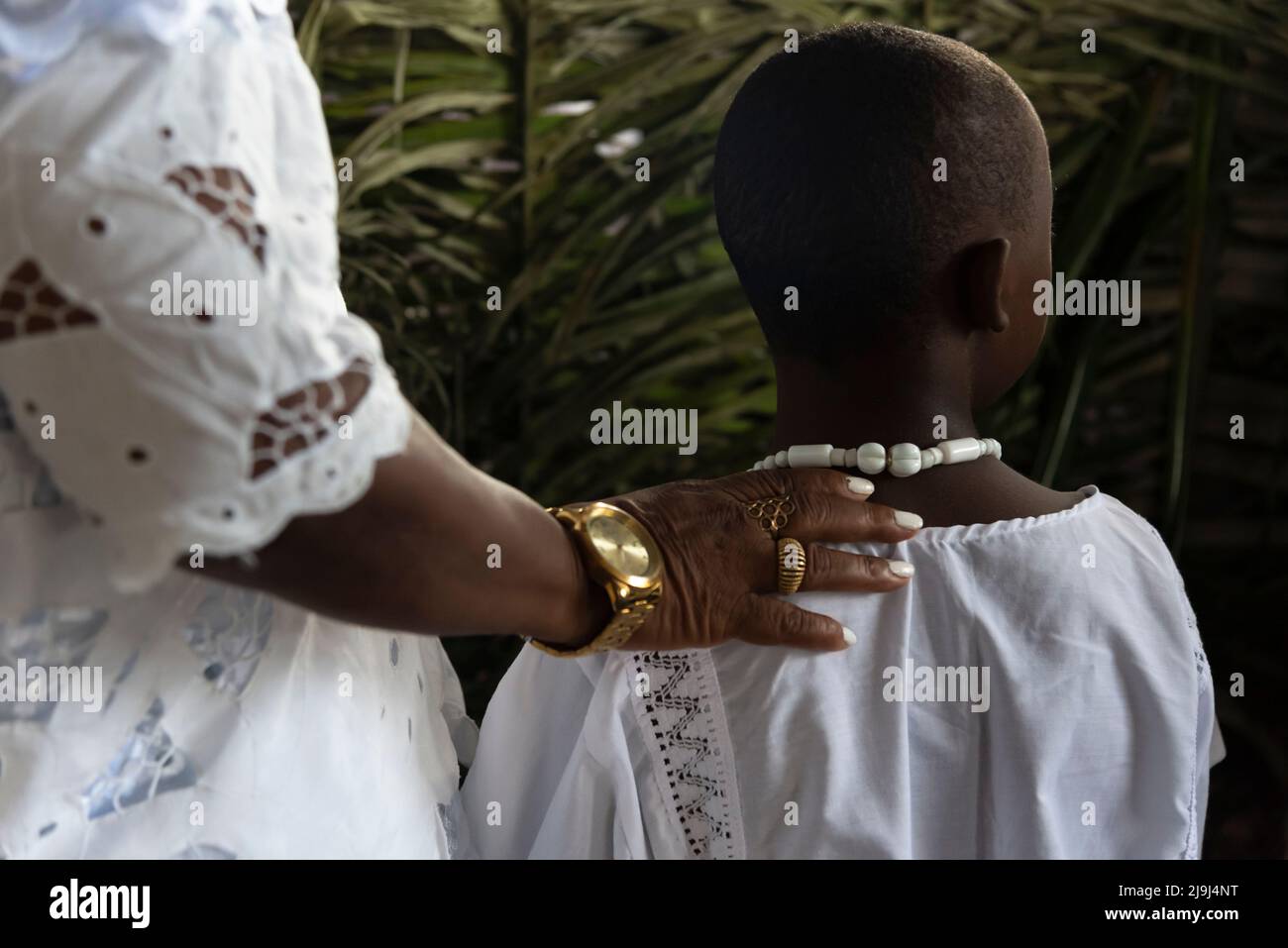 Members of the Candomble religion are seen during a religious ...