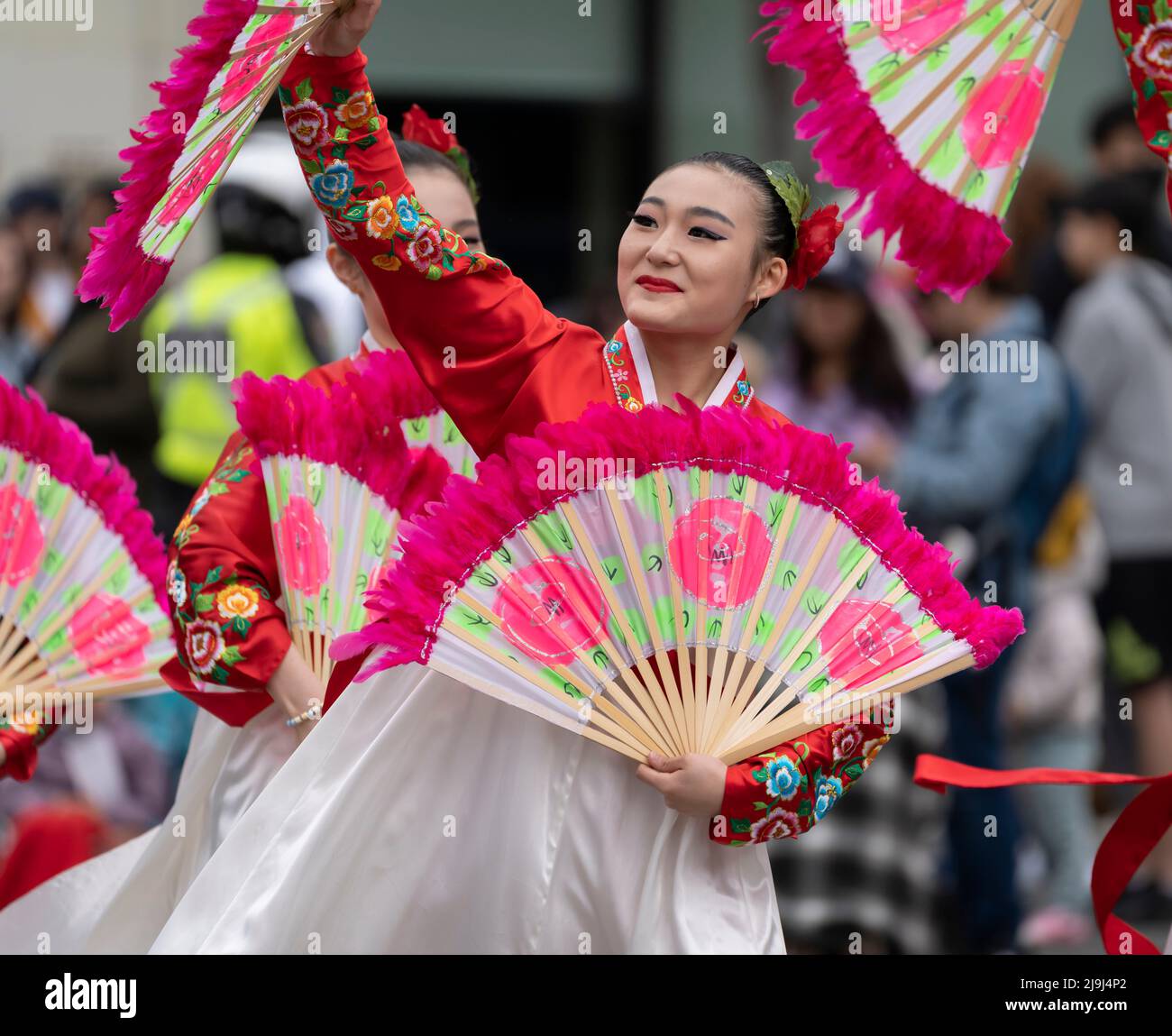 Dancers with fans at the Victoria Day Parade on May 23, 2022 in ...