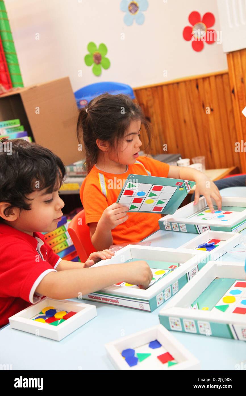 Boy and girl classroom brain hi-res stock photography and images - Alamy