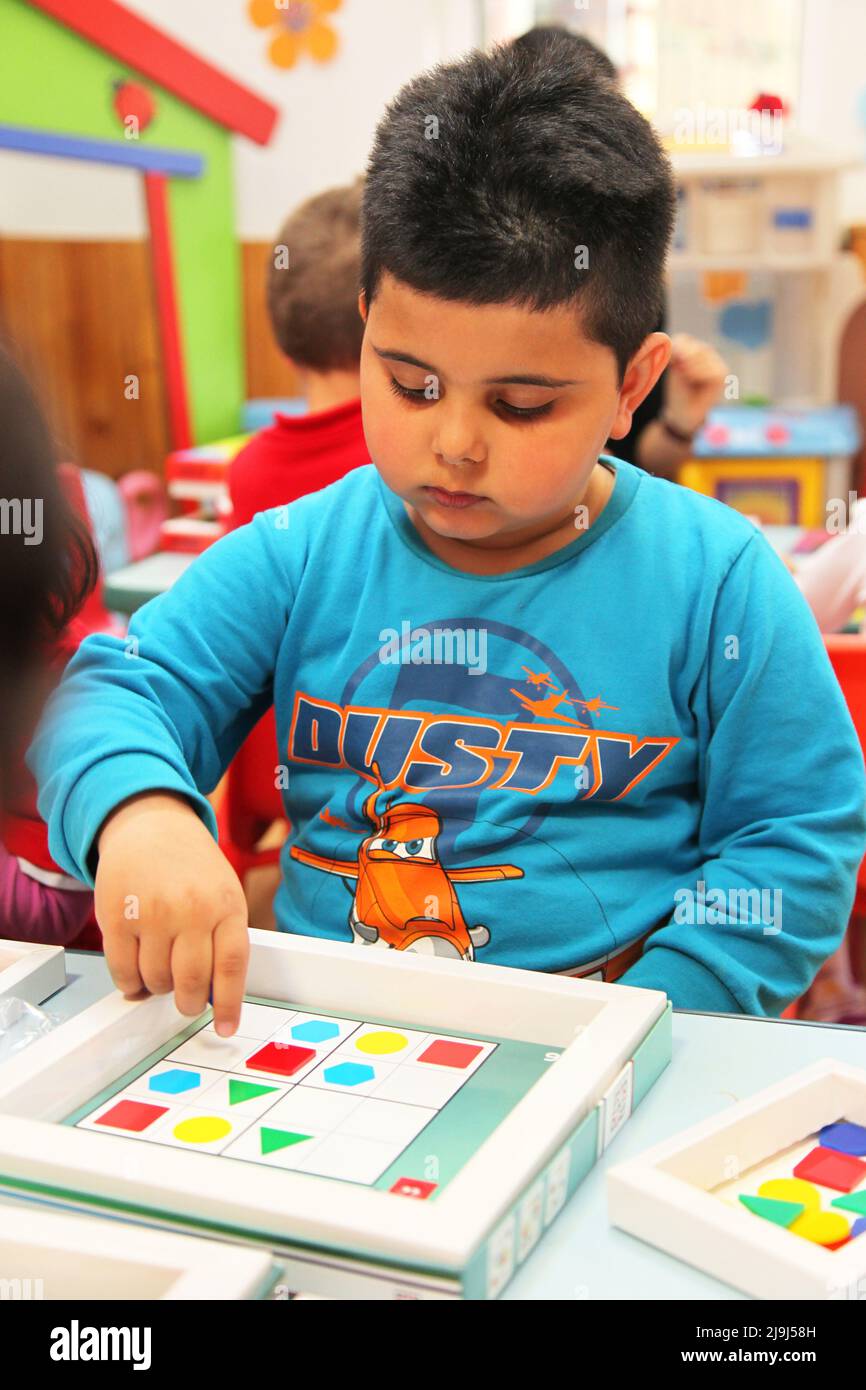 ISTANBUL, TURKEY - APRIL 4: Child learning intelligence games in ...
