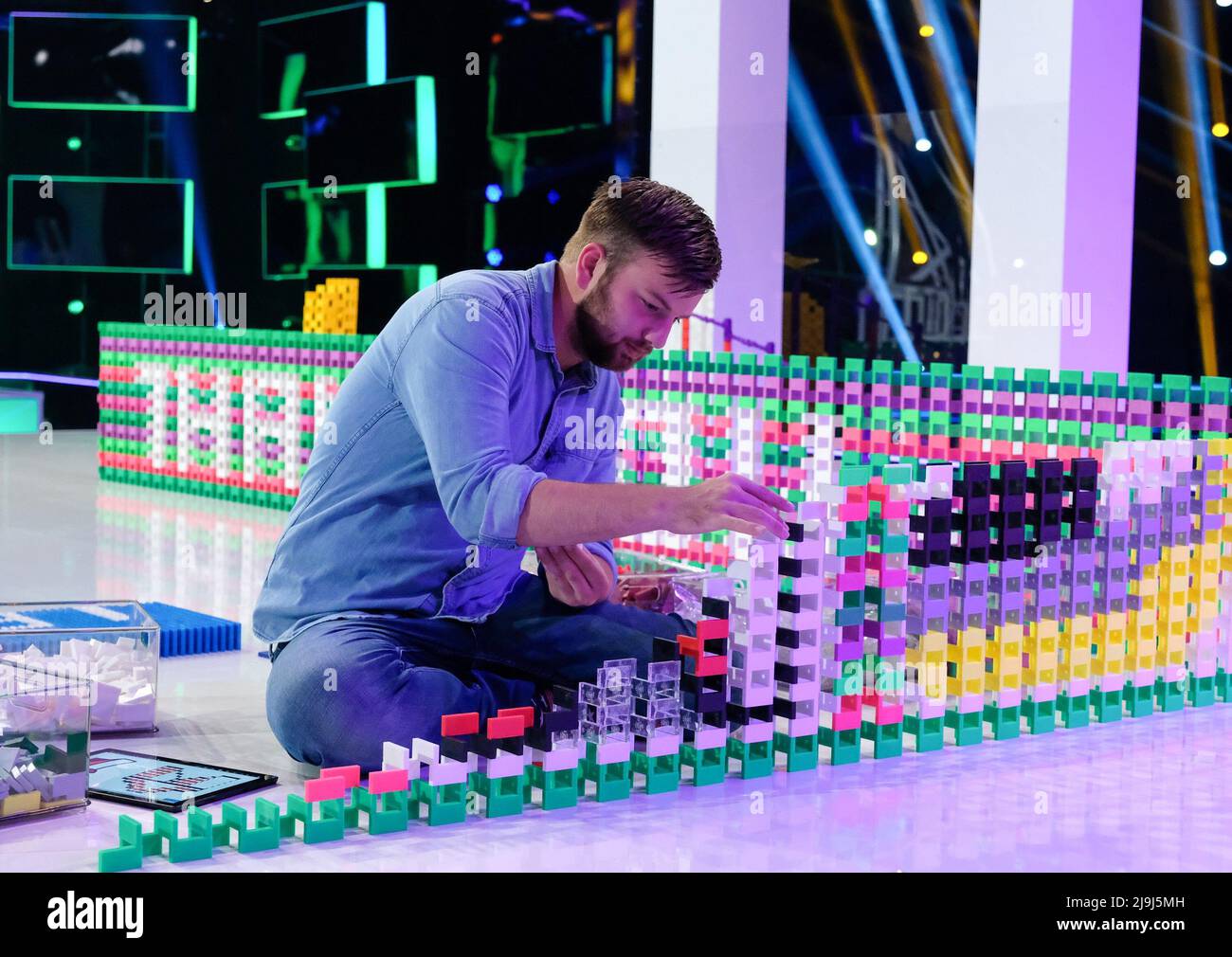 DOMINO MASTERS, contestants from Team Mechanical Mavericks (Gabe Dean ...