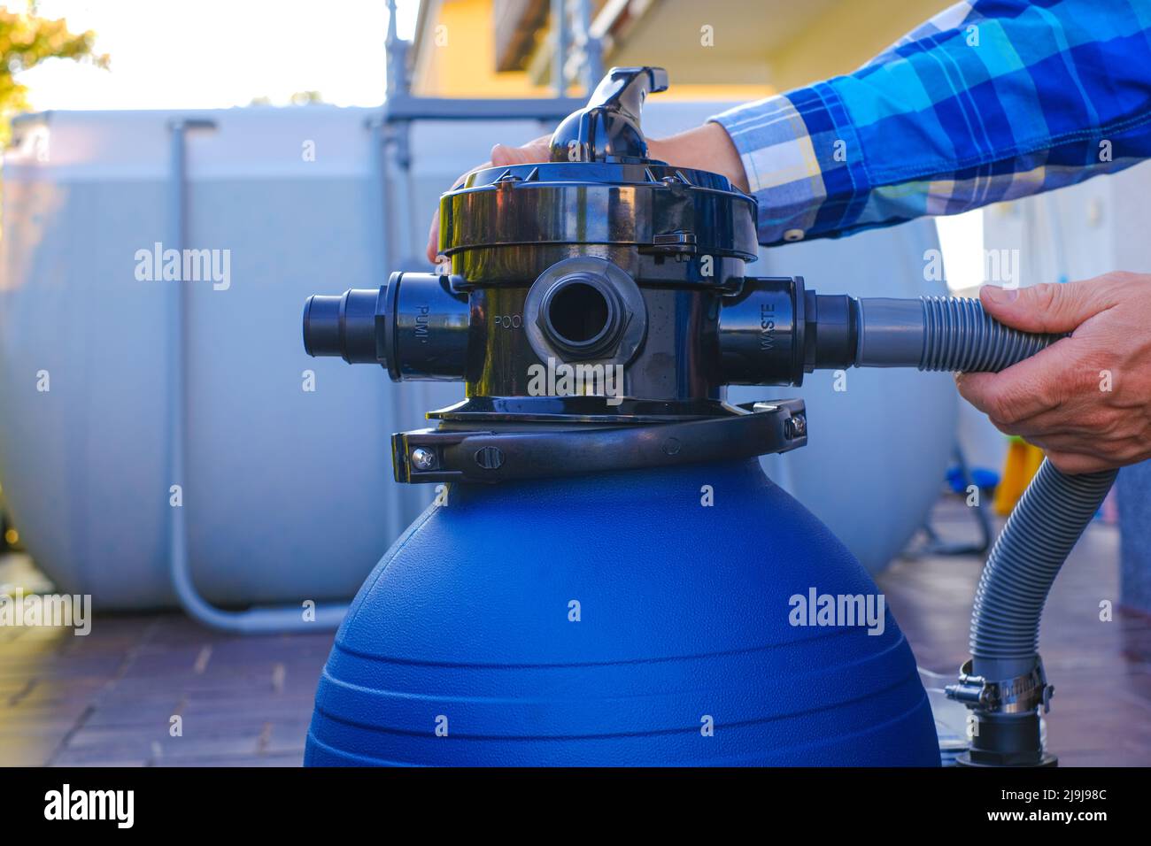 pool Filter.water filtration. water filter in the hands of a man on a ...
