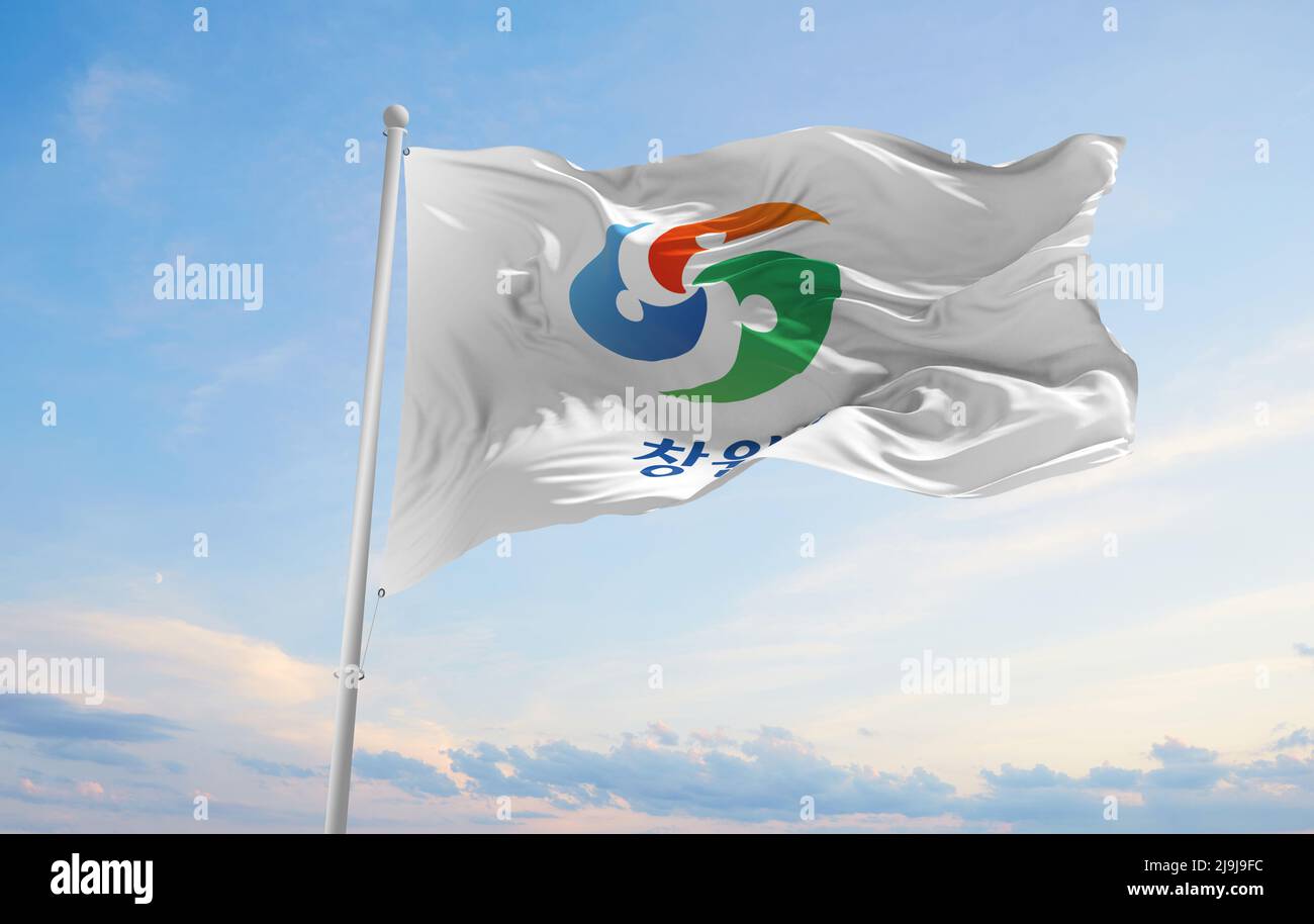 official flag of Changwon city, South Korea at cloudy sky background on ...